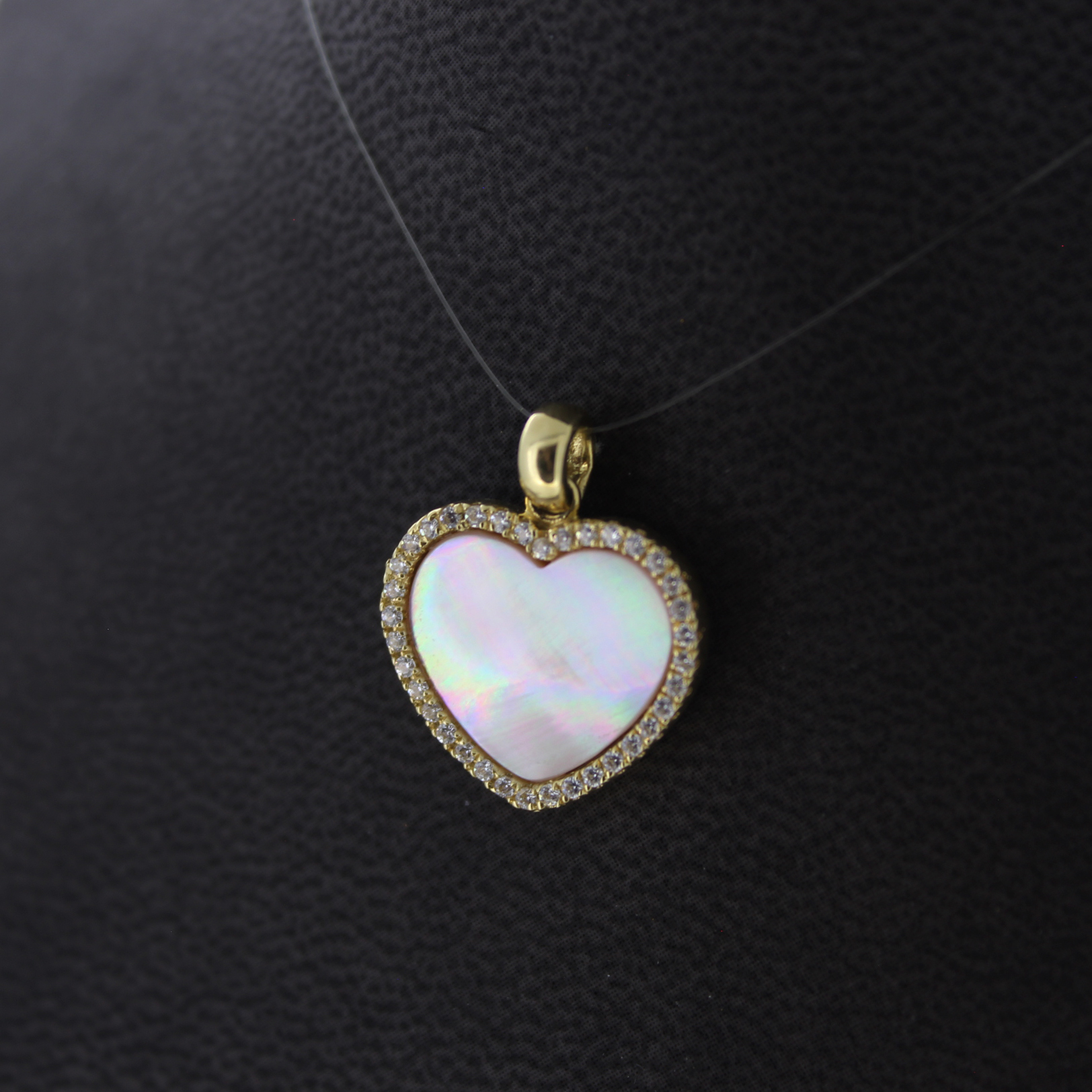 Tweedehands hanger, vervaardigd uit geelgoud 18 karaat met zirconium en ...